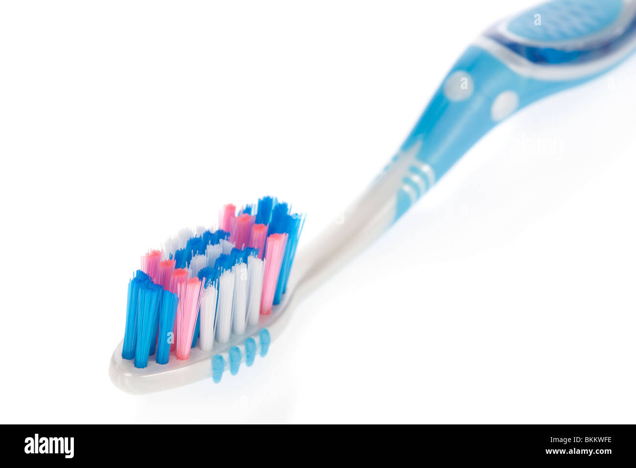 Modern toothbrush isolated on a white background Stock Photo - Alamy