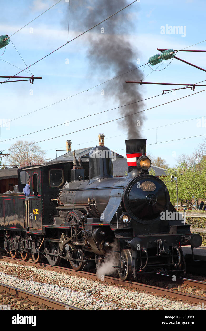 Preserved steam locomotive starting on its journey, Rungsted Kyst ...