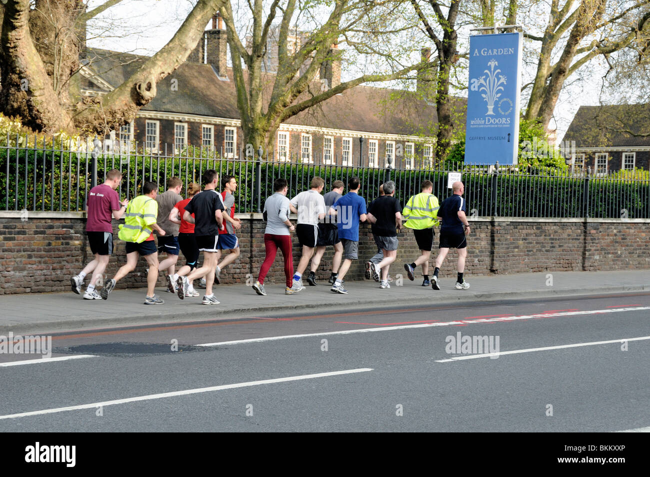 Group of people running in an urban street Stock Photo - Alamy