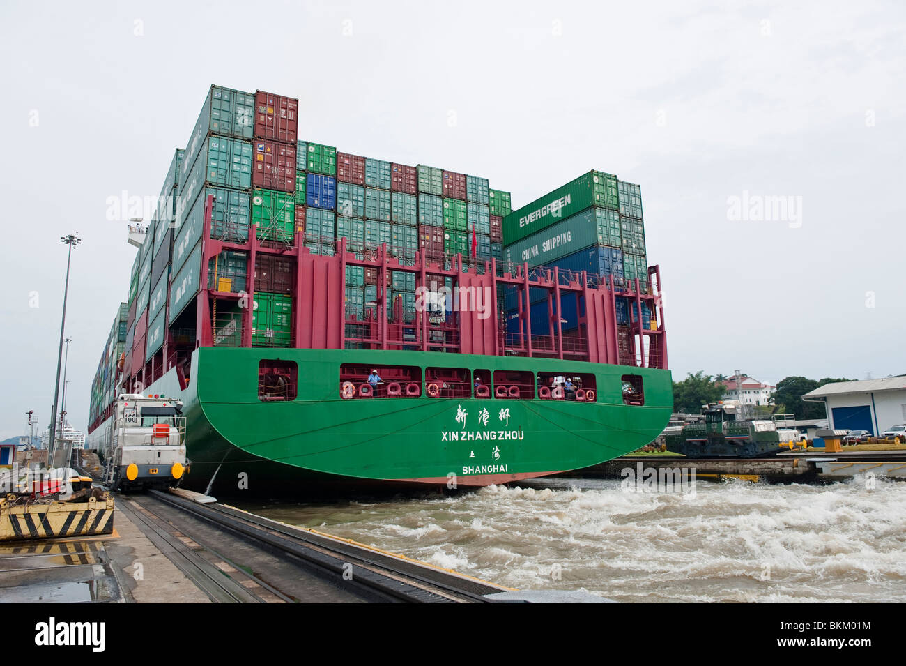 A Panamax Container Ship Transits Miraflores Locks, Panama Canal Stock ...