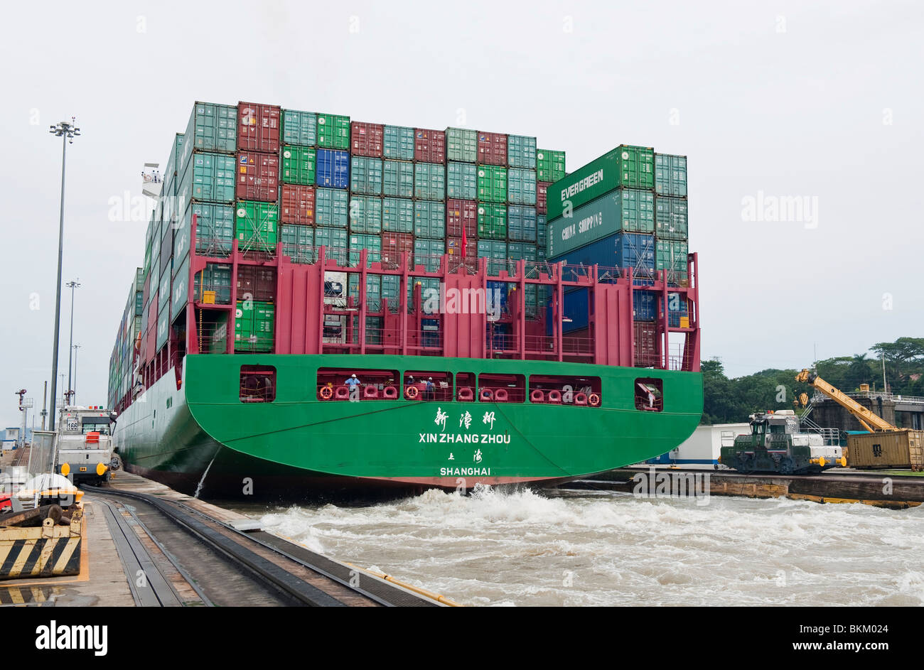 A Panamax Container Ship Transits Miraflores Locks, Panama Canal Stock ...
