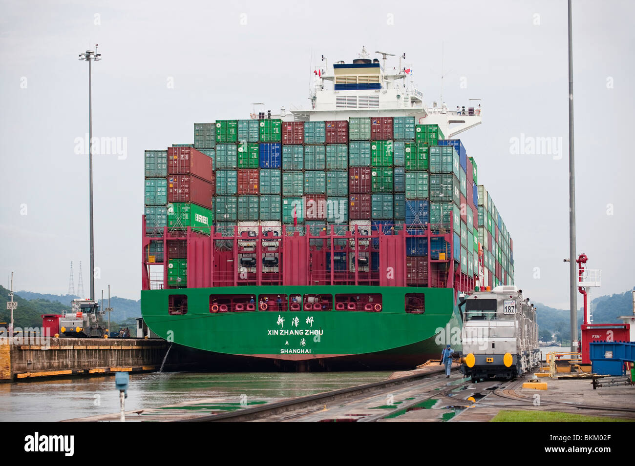 A Panamax Container Ship Transits Miraflores Locks, Panama Canal Stock ...