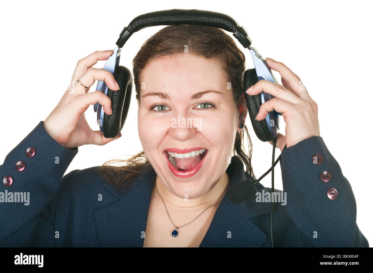 Smiling operator young woman in a call center. Isolated on white ...