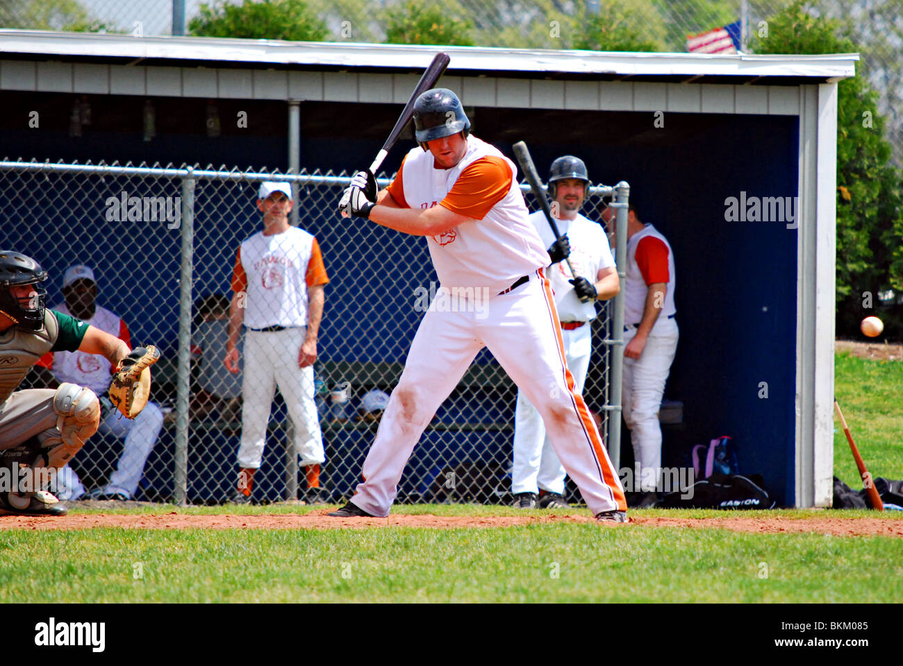 Mens baseball league, man swings at a nice pitch Stock Photo - Alamy