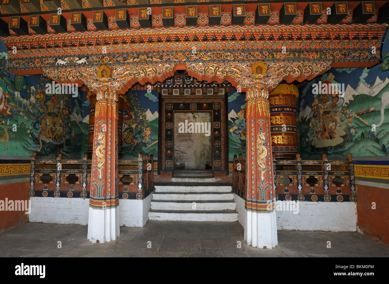 Entrance to temple interior with prayer wheel Trongsa Dzong Bhutan ...