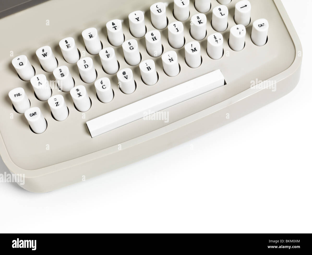 Closeup of a retro typewriter keyboard isolated on white background ...