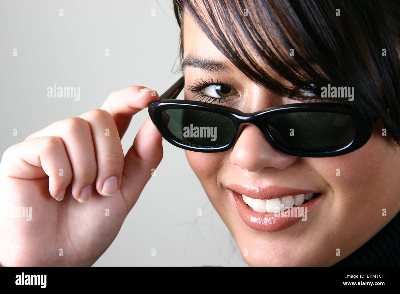 Sunglasses portrait young woman Stock Photo - Alamy