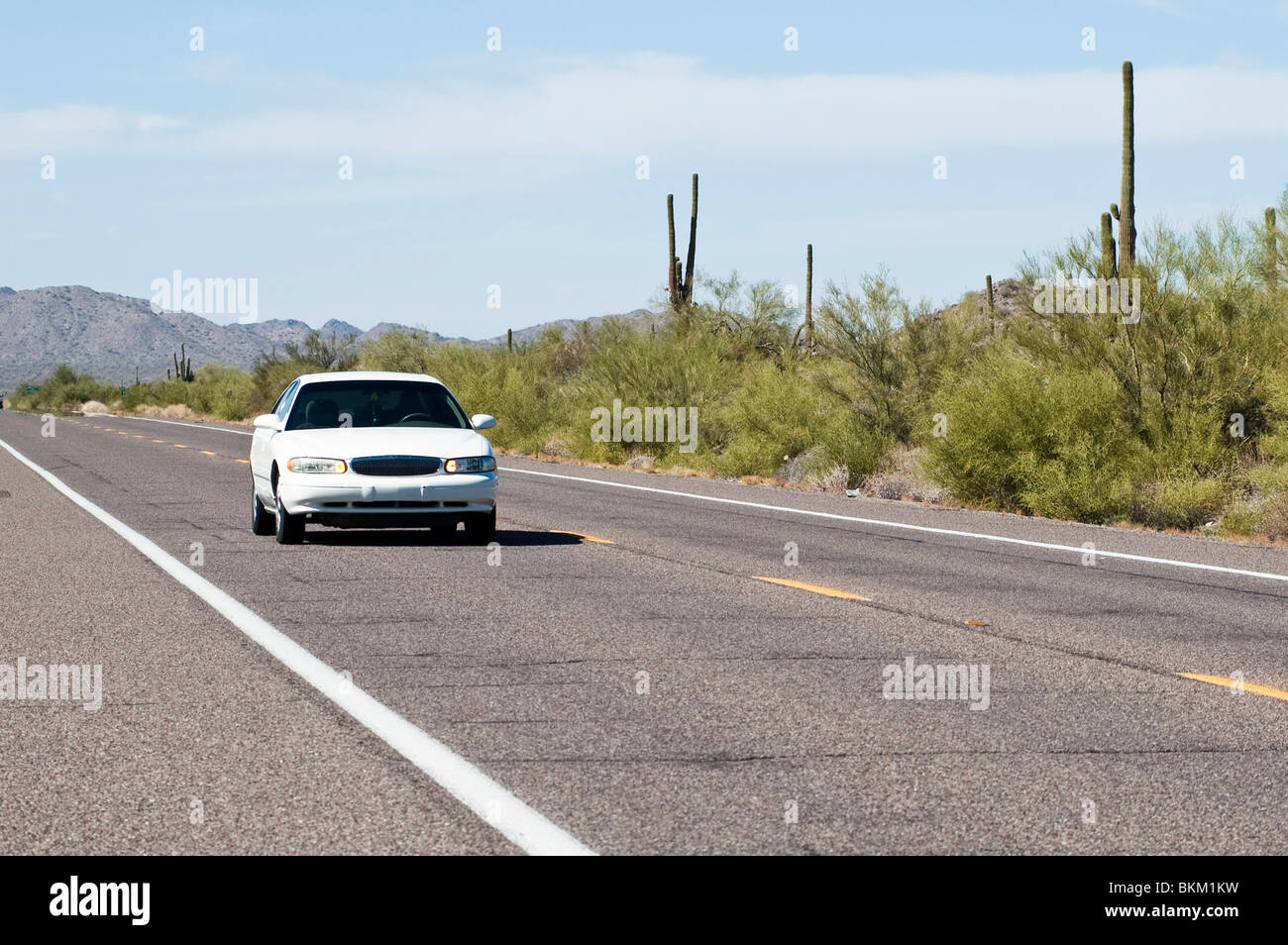 Car driving through desert hi-res stock photography and images - Alamy