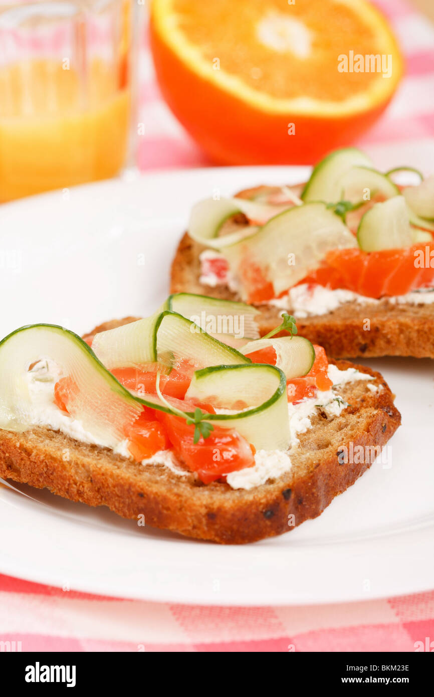 Toast with vegetables and fish Stock Photo - Alamy
