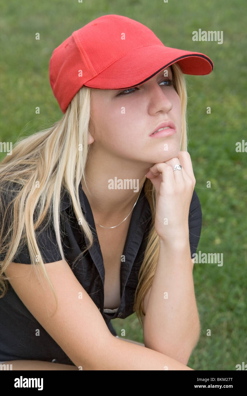 girl with red baseball cap Stock Photo - Alamy