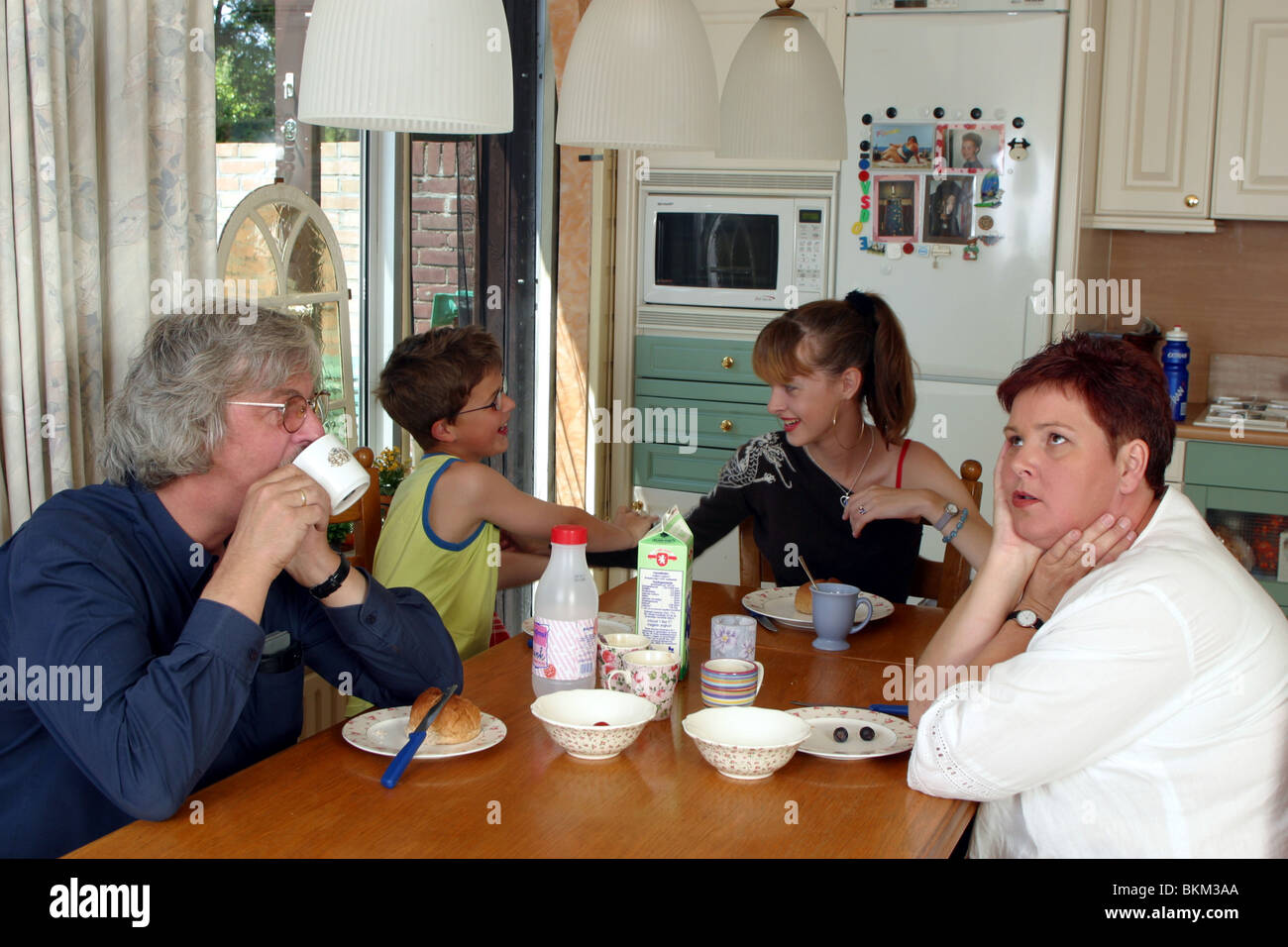 Tired parents ignoring bad behaviour hi-res stock photography and ...