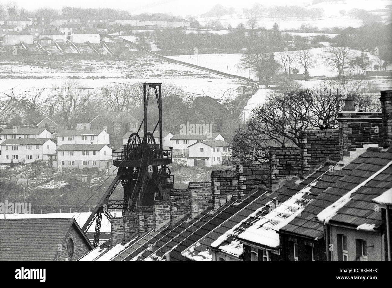View over rooftops to Deep Navigation Colliery Treharris Mid Glamorgan ...