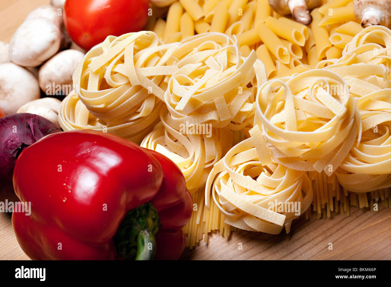 Cooking with fresh italian ingredients Stock Photo - Alamy