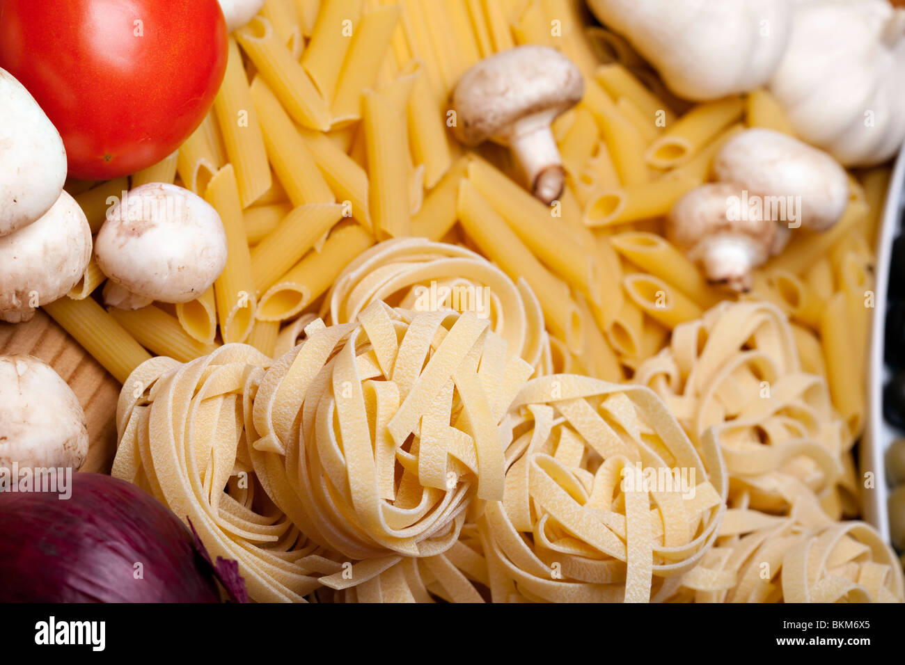 Cooking with fresh italian ingredients Stock Photo - Alamy