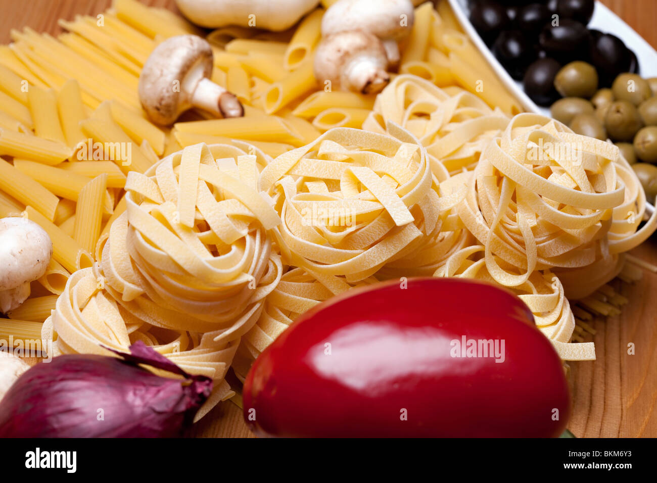 Cooking with fresh italian ingredients Stock Photo - Alamy