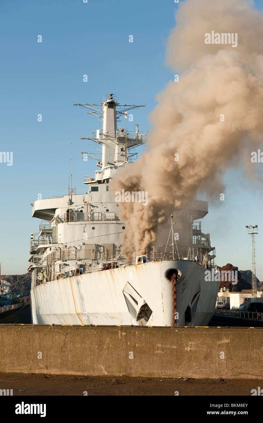 Ex Navy Ship on fire in dock with large volumes of smoke coming from ...