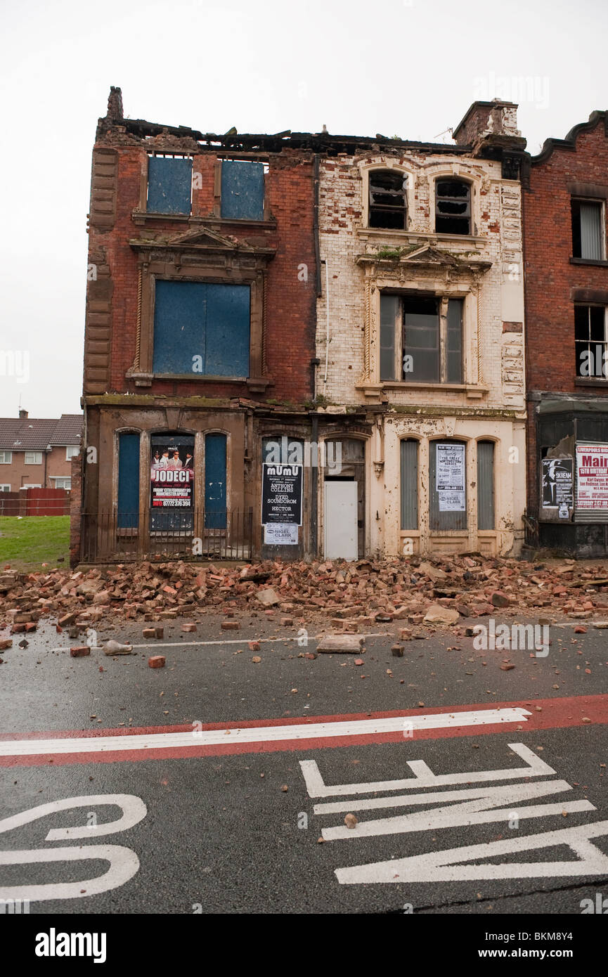 Old building collapsed on road Stock Photo - Alamy