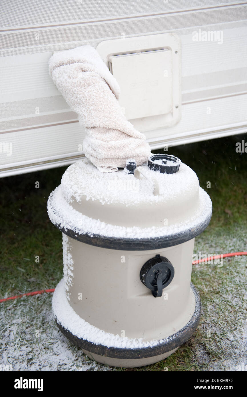 Caravan Aquaroll protected against snow and ice freezing Stock Photo ...