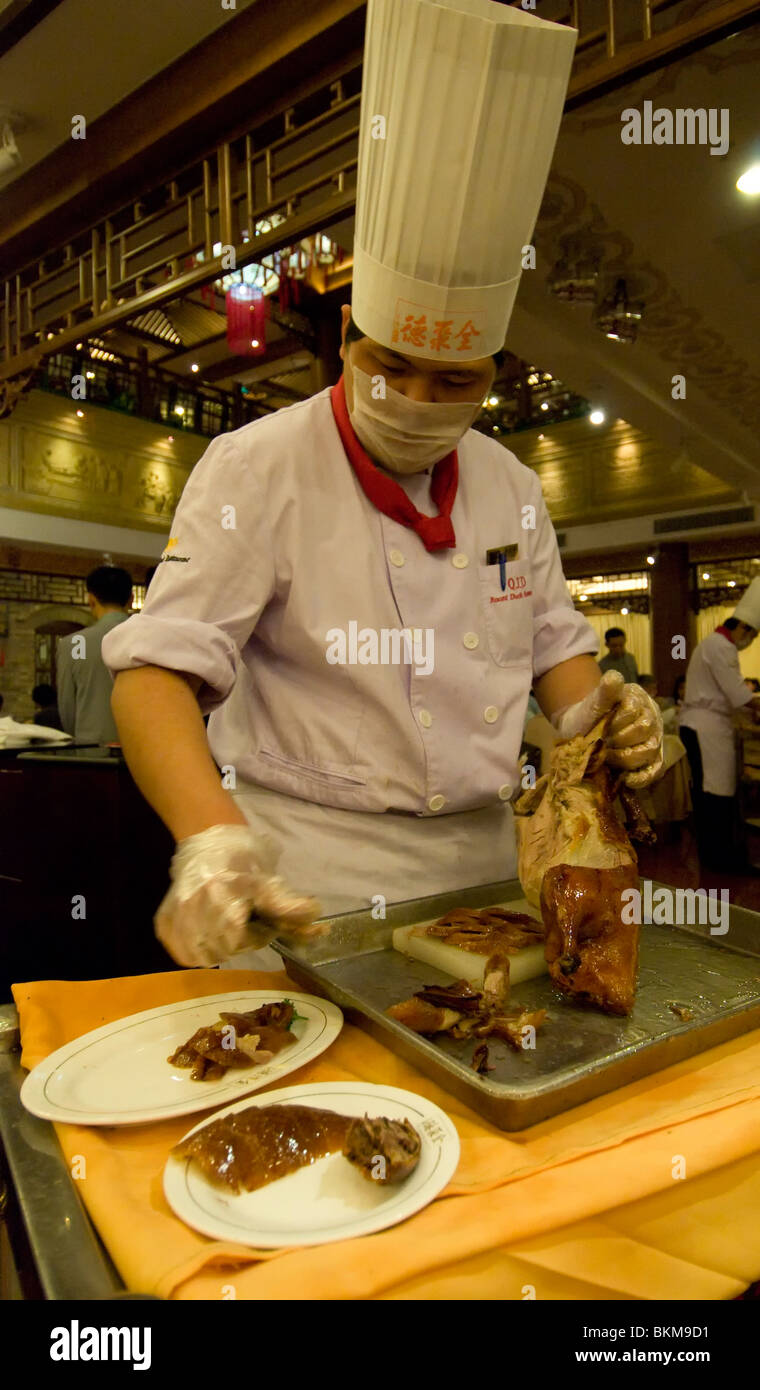 Chef serving famous Beijing Duck Stock Photo - Alamy
