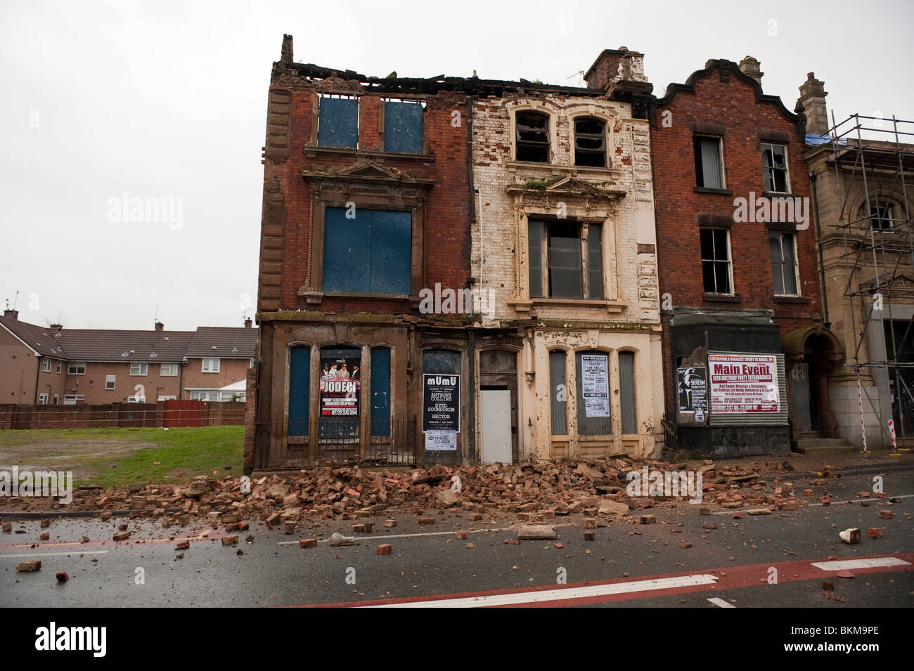 Old building collapsed on road Stock Photo - Alamy