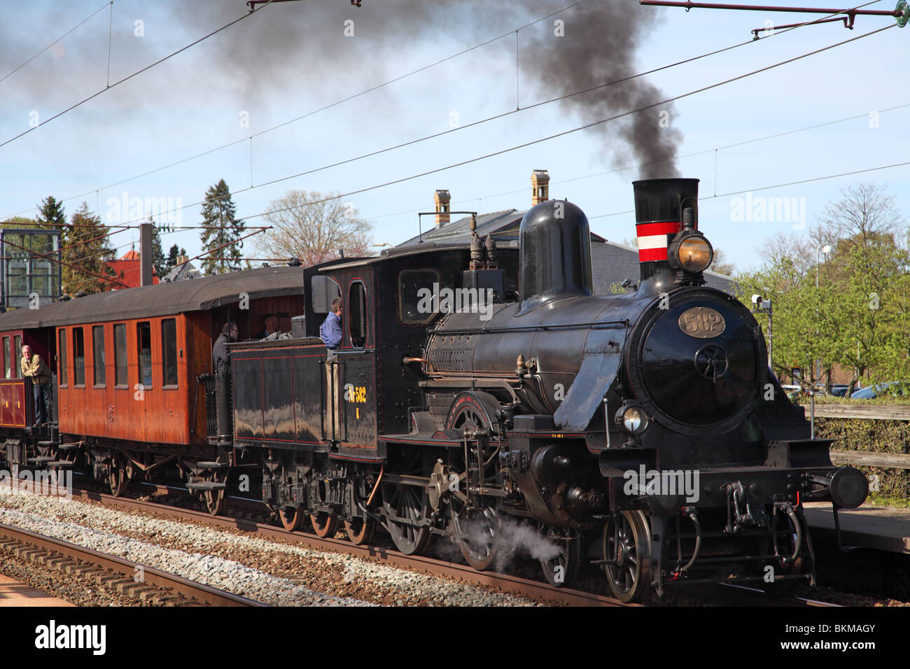 Preserved steam locomotive starting on its journey, Rungsted Kyst ...