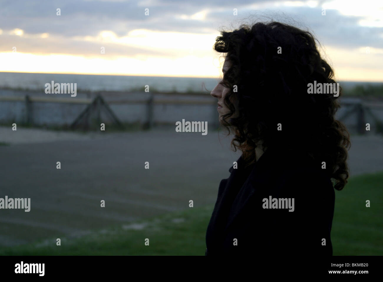 Anonymous woman alone outdoors silhouette Woman silhouette Stock Photo ...