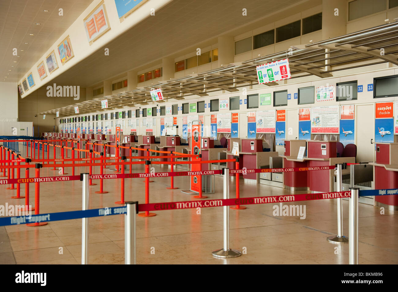Airport check in desks empty flights canceled Stock Photo - Alamy