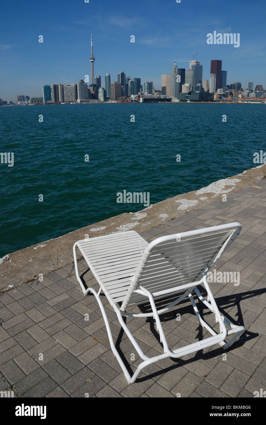 A reclining beach chair overlooking Lake Ontario and the city of ...