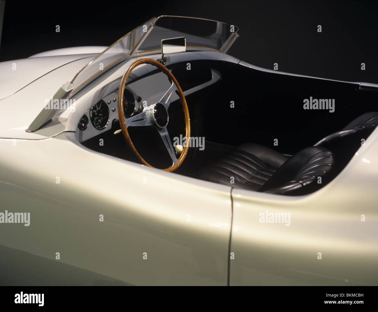 Photograph of the cockpit of an old Porsche car roadster with a wooden ...