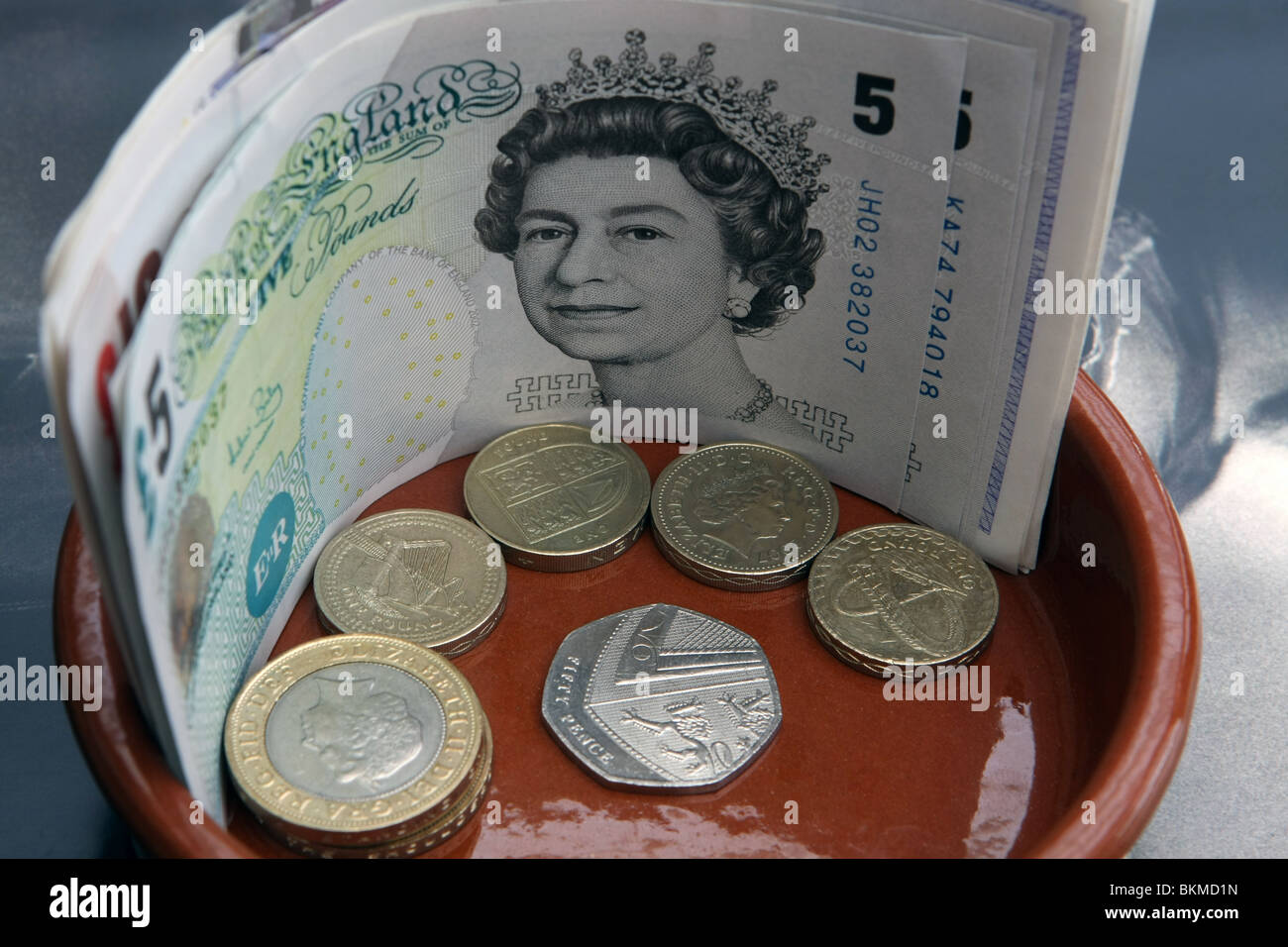 English notes piles hi-res stock photography and images - Alamy