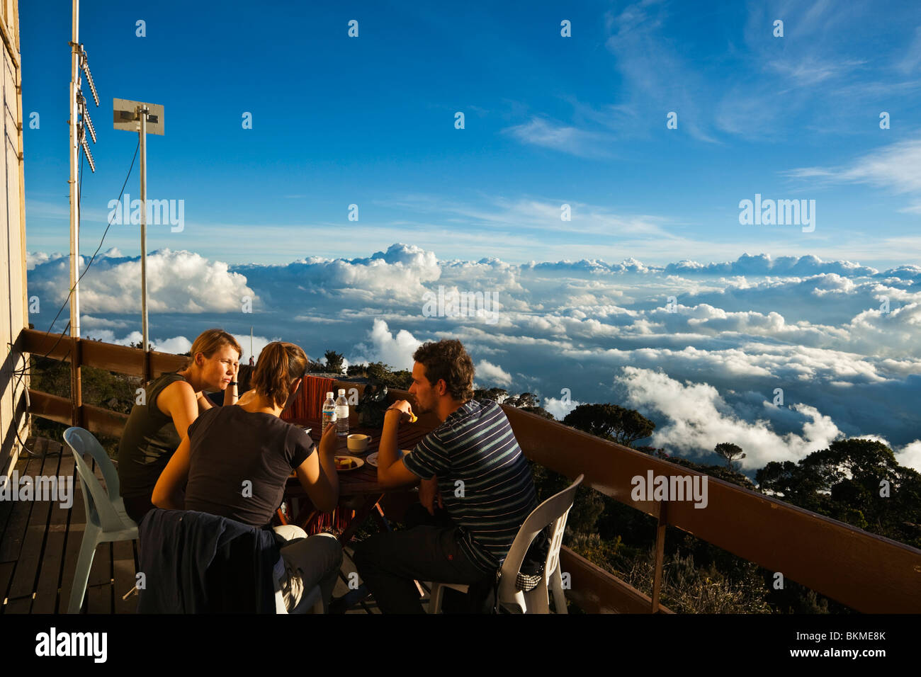 Hikers enjoy lunch above the clouds at Laban Rata resthouse, on Mt ...