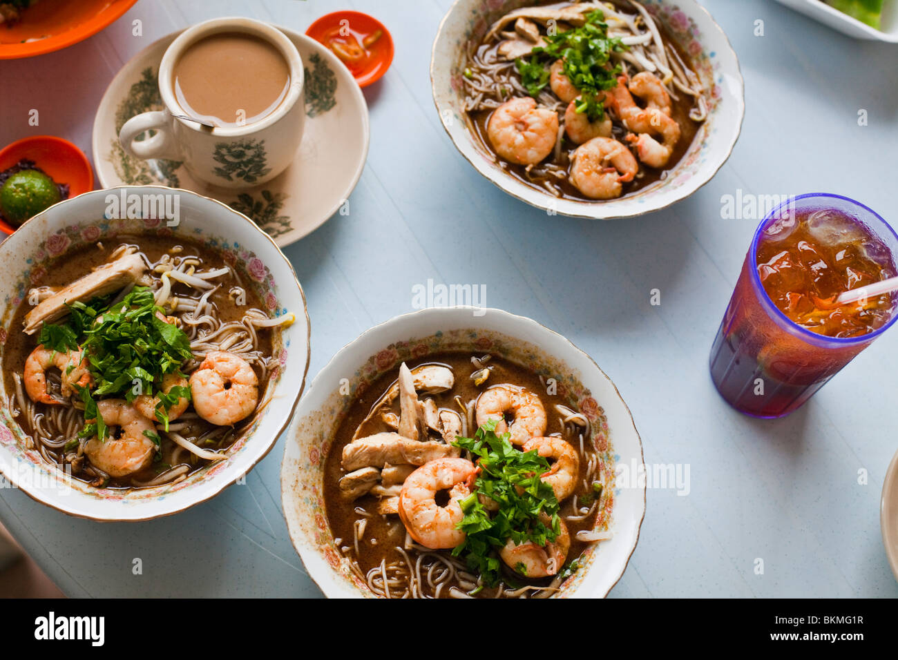 Bowls of prawn laksa - a Malaysian speciality. Kuching, Sarawak, Borneo ...