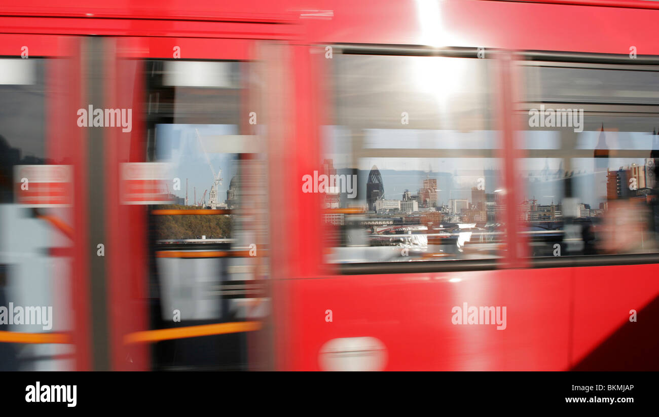 The Gherkin Building through the window of a London Red Bus Stock Photo ...