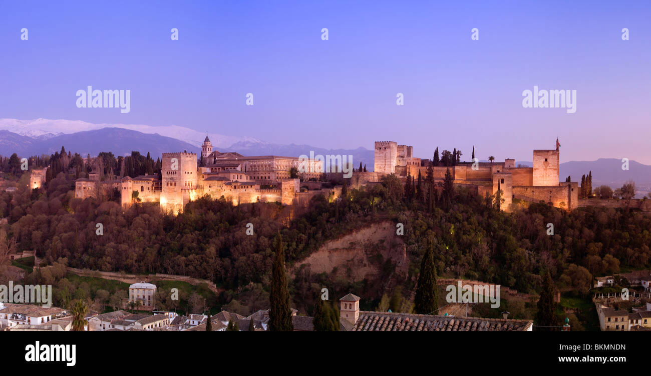 Panorama of the Alhambra Palace and Sierra Nevada mountains at twilight ...