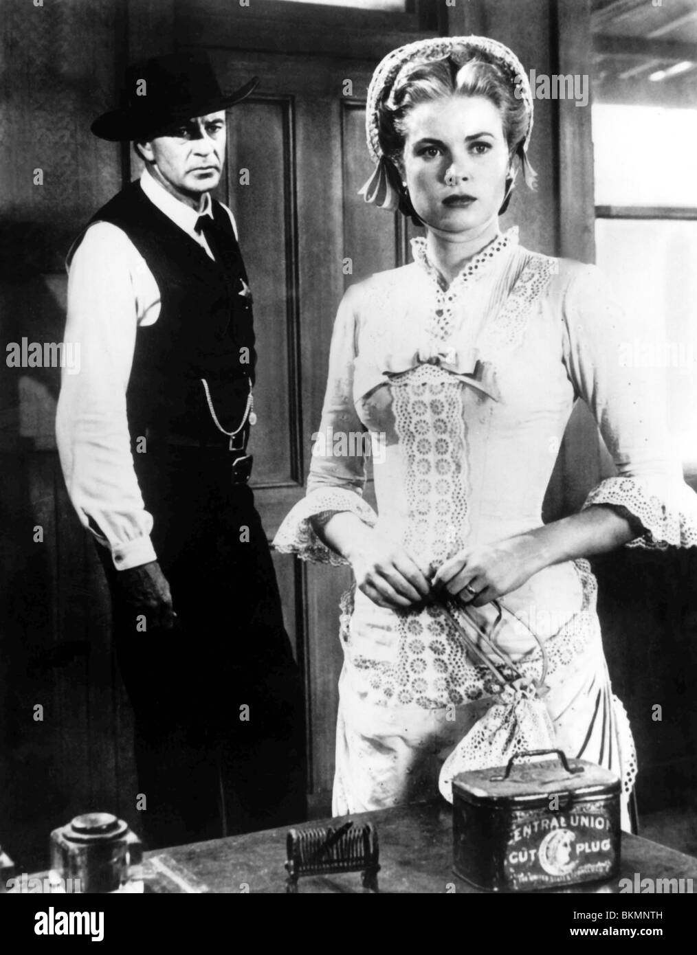 HIGH NOON (1952) GARY COOPER, GRACE KELLY HGN 012 P Stock Photo - Alamy