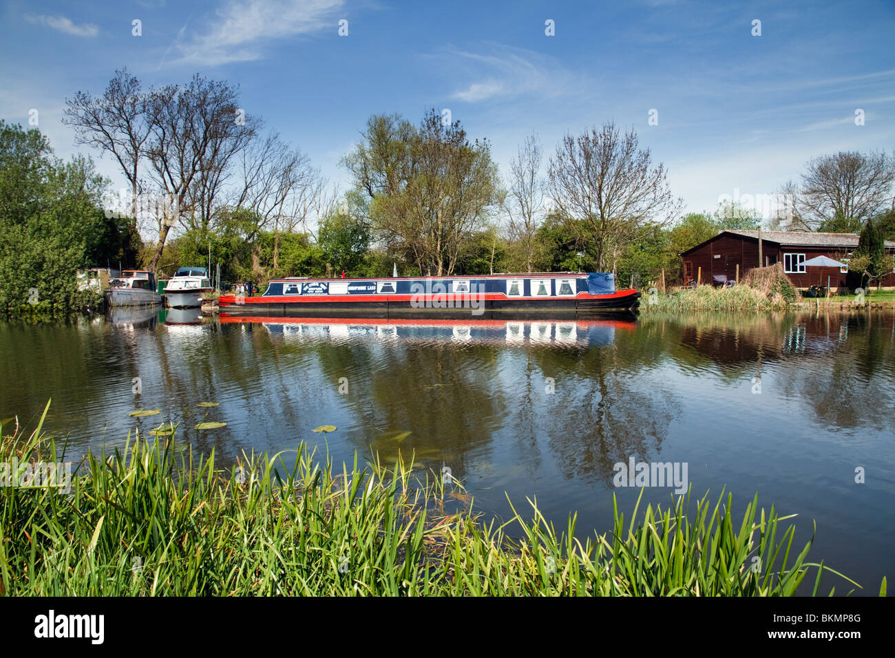 The River Ouse A Longboat Barge Near Houghton Village In Cambridgeshire ...