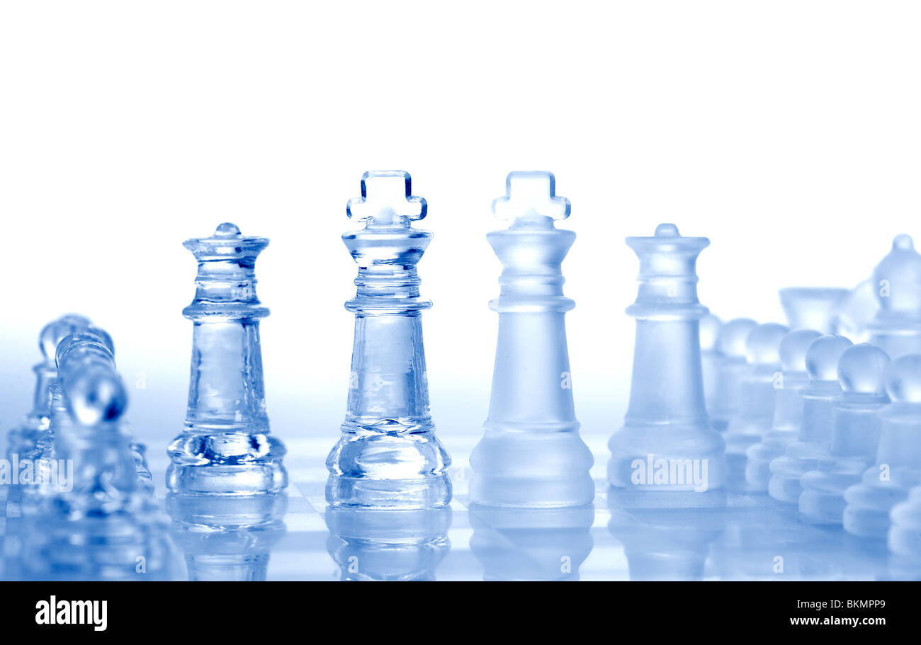 glass chess pieces with blue light Stock Photo - Alamy