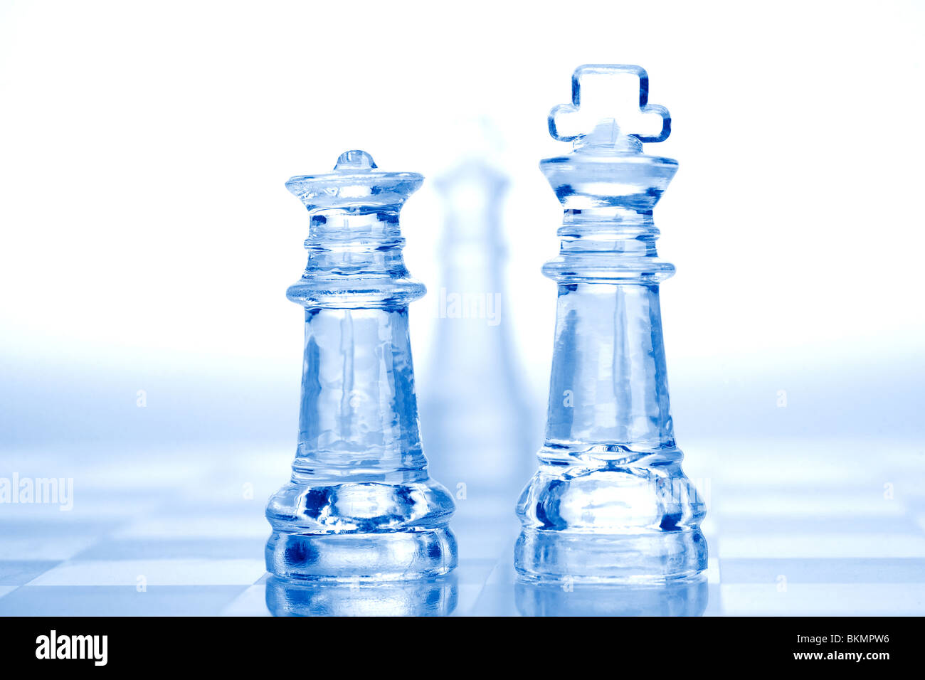 glass chess pieces with blue light Stock Photo - Alamy