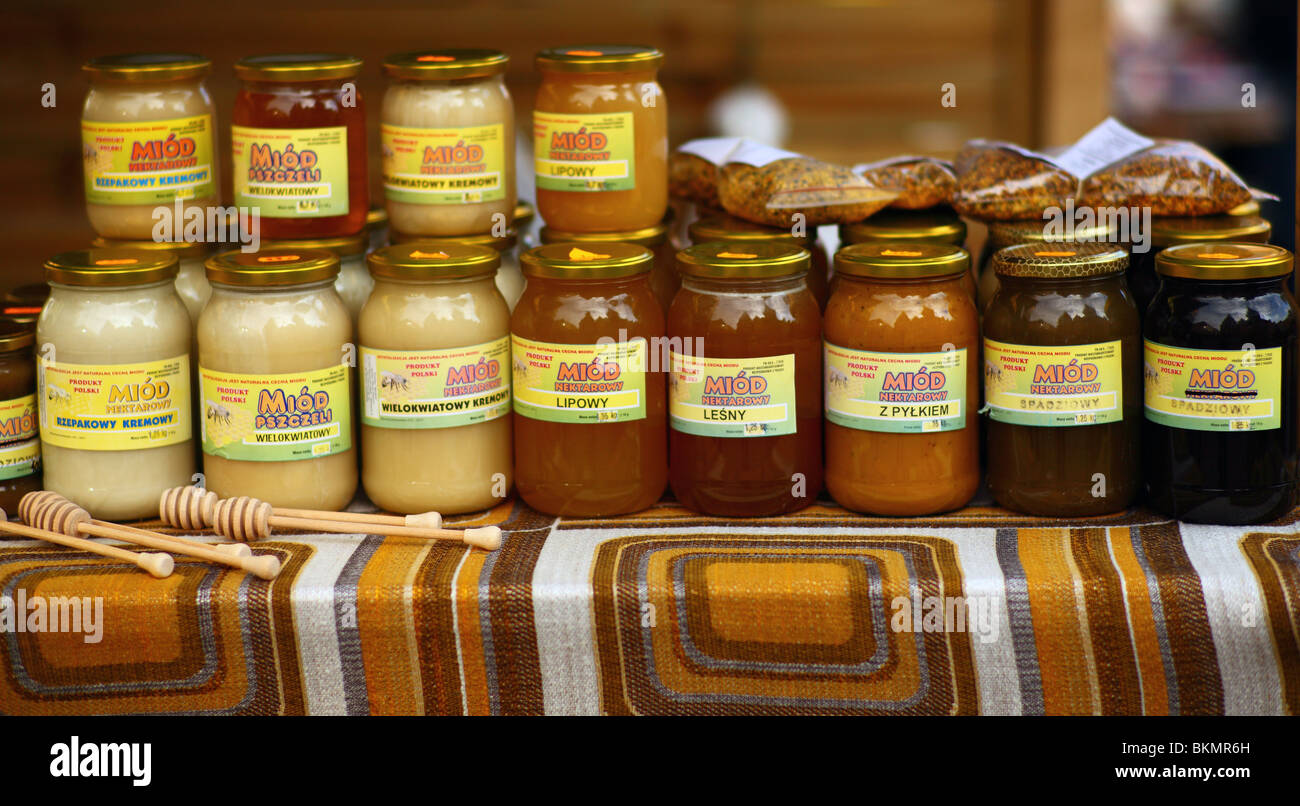 Bee honey jars on display Stock Photo - Alamy
