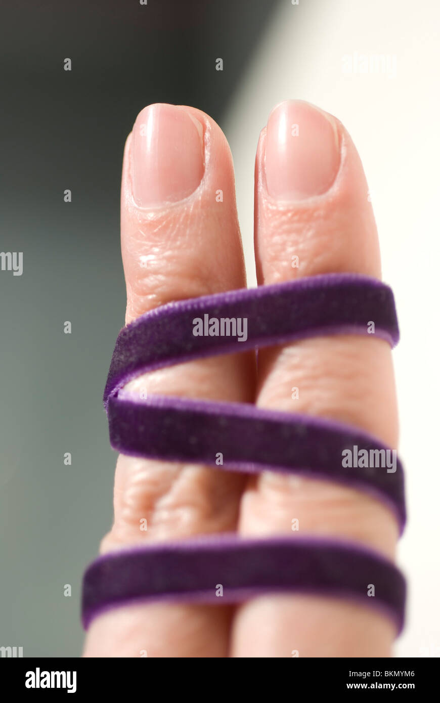 Hands stretching ribbon hi-res stock photography and images - Alamy
