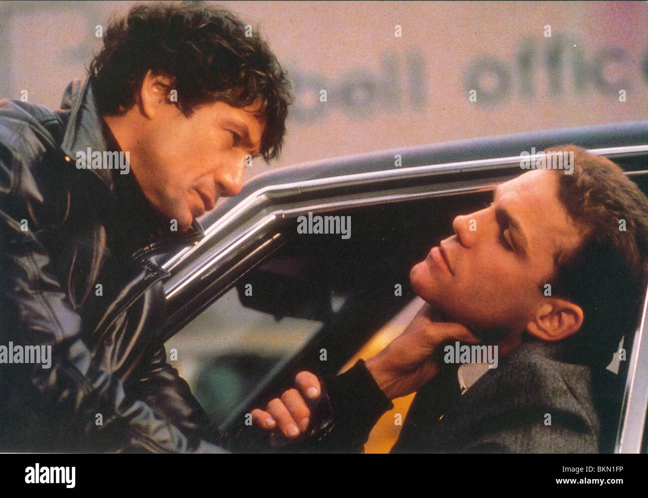 REMO: UNARMED AND DANGEROUS (1985) FRED WARD REM 008FOH Stock Photo - Alamy