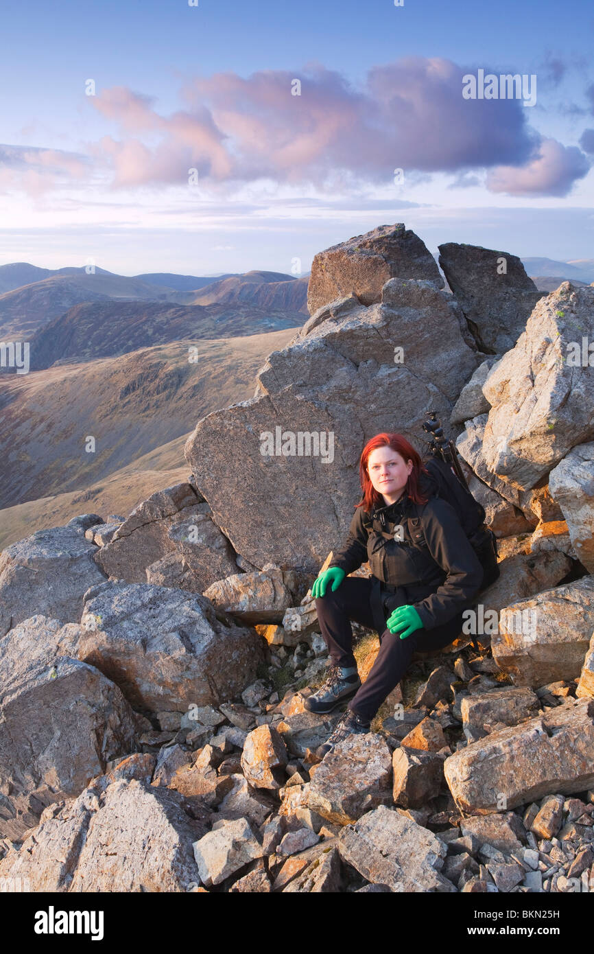 A female walker photographer on Great Gable in the Lake District ...