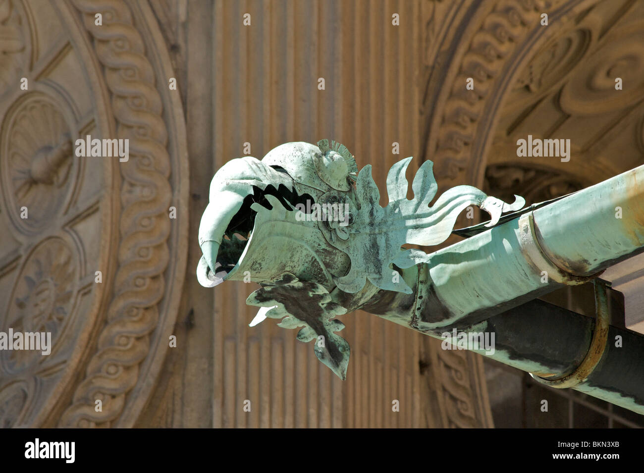 Copper guttering with fictional bird gargoyle on the exterior of the ...
