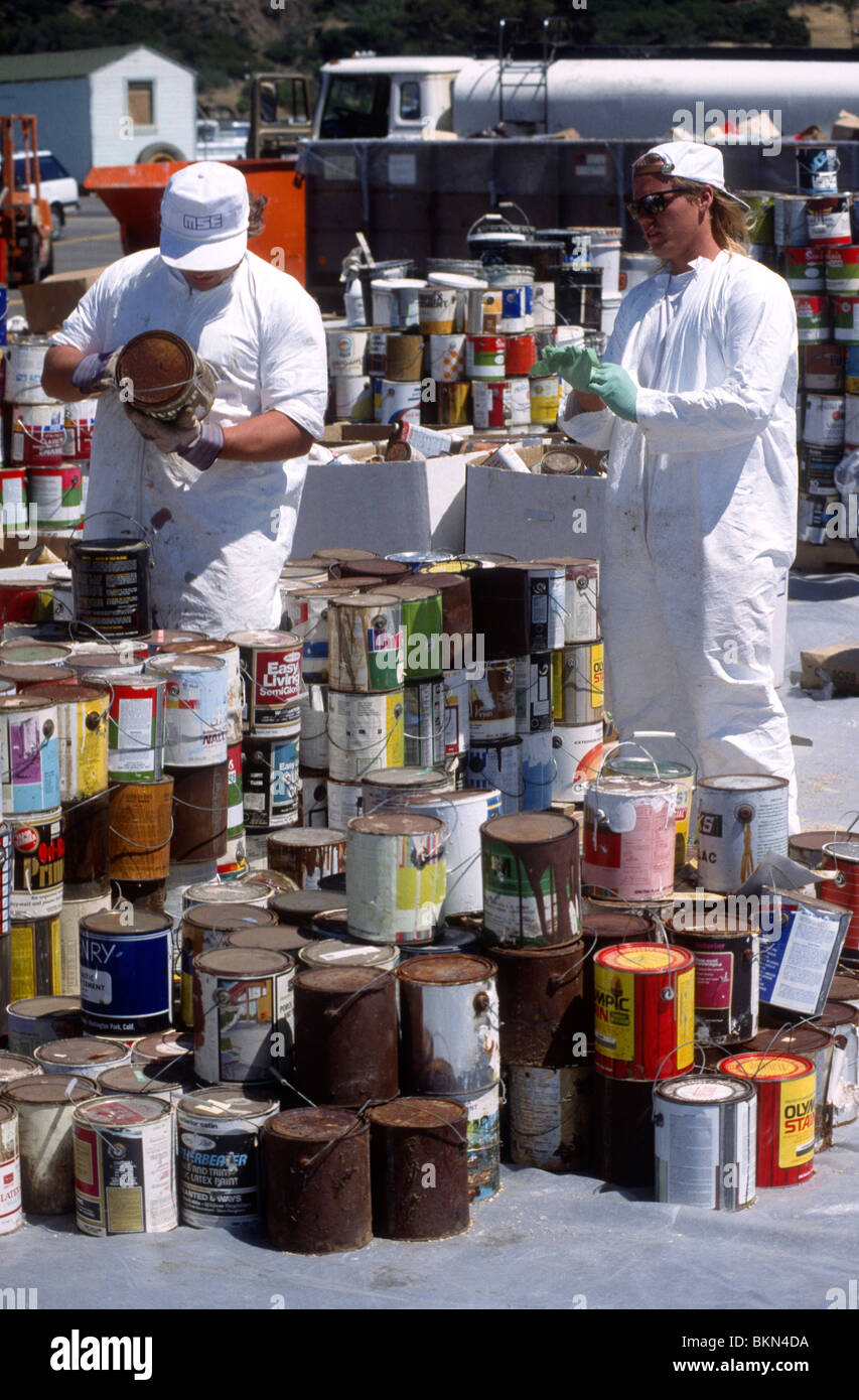 Crews work in a recycle center for toxic waste Stock Photo - Alamy