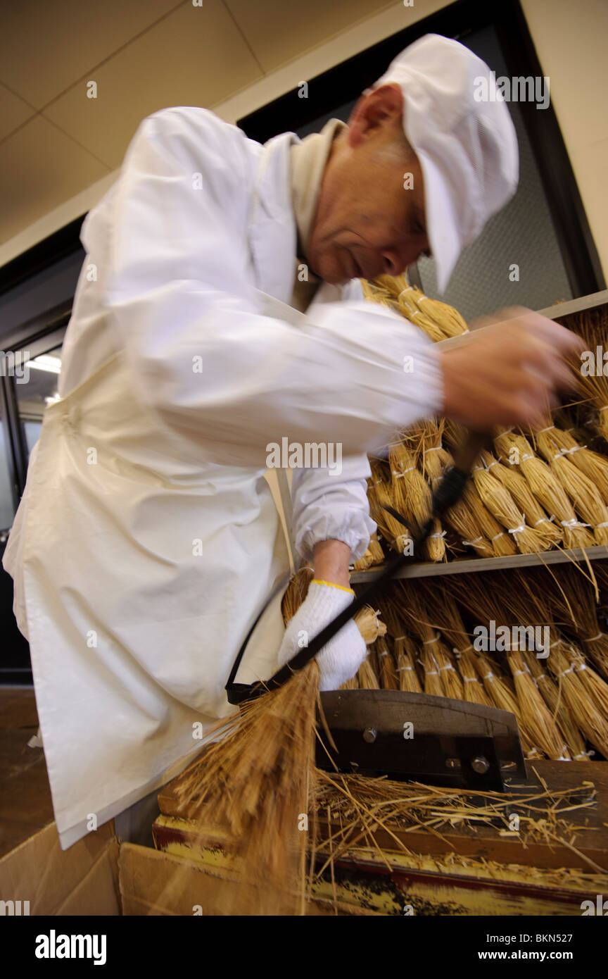 Trimming straw wrapped natto, Mito Tengu Natto, Mito, Ibaraki Pref ...