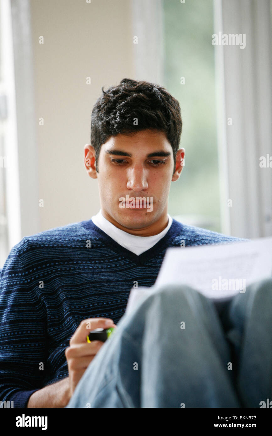 Male student studying in a lecture at university Stock Photo - Alamy