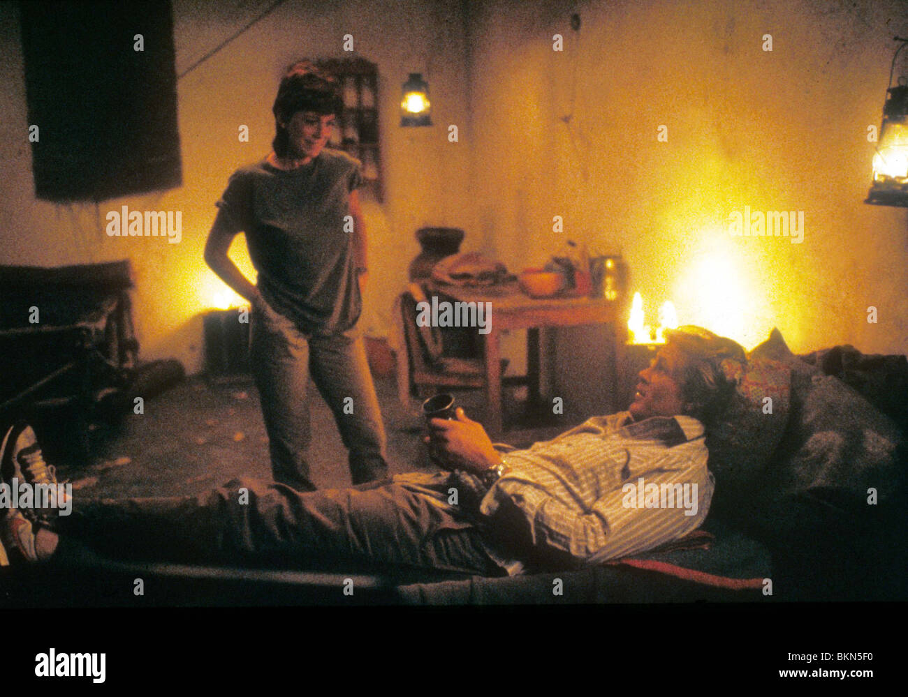 UNDER FIRE (1983) JOANNA CASSIDY, NICK NOLTE UNFR 034 L Stock Photo - Alamy