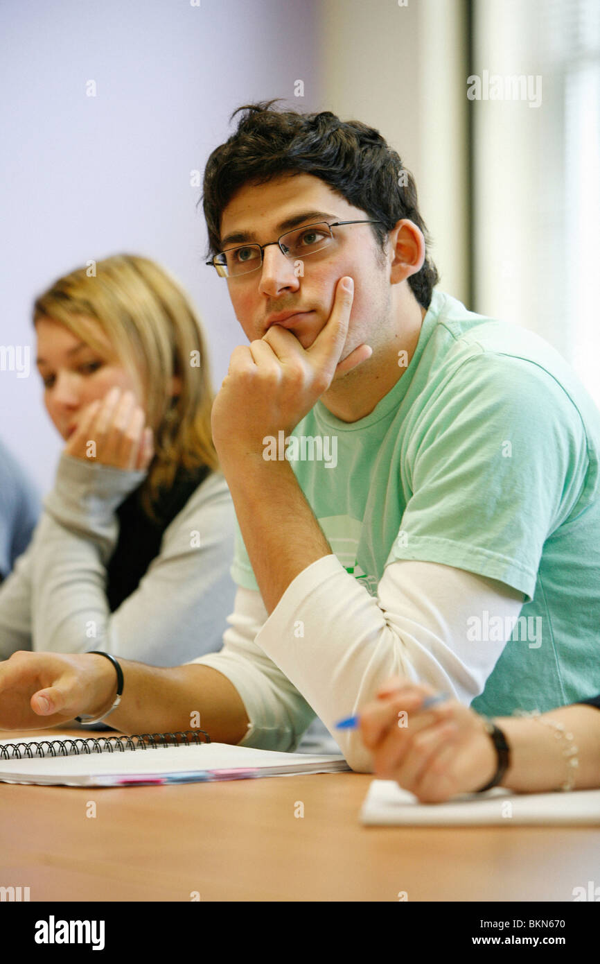 Male student studying in a lecture at university Stock Photo - Alamy