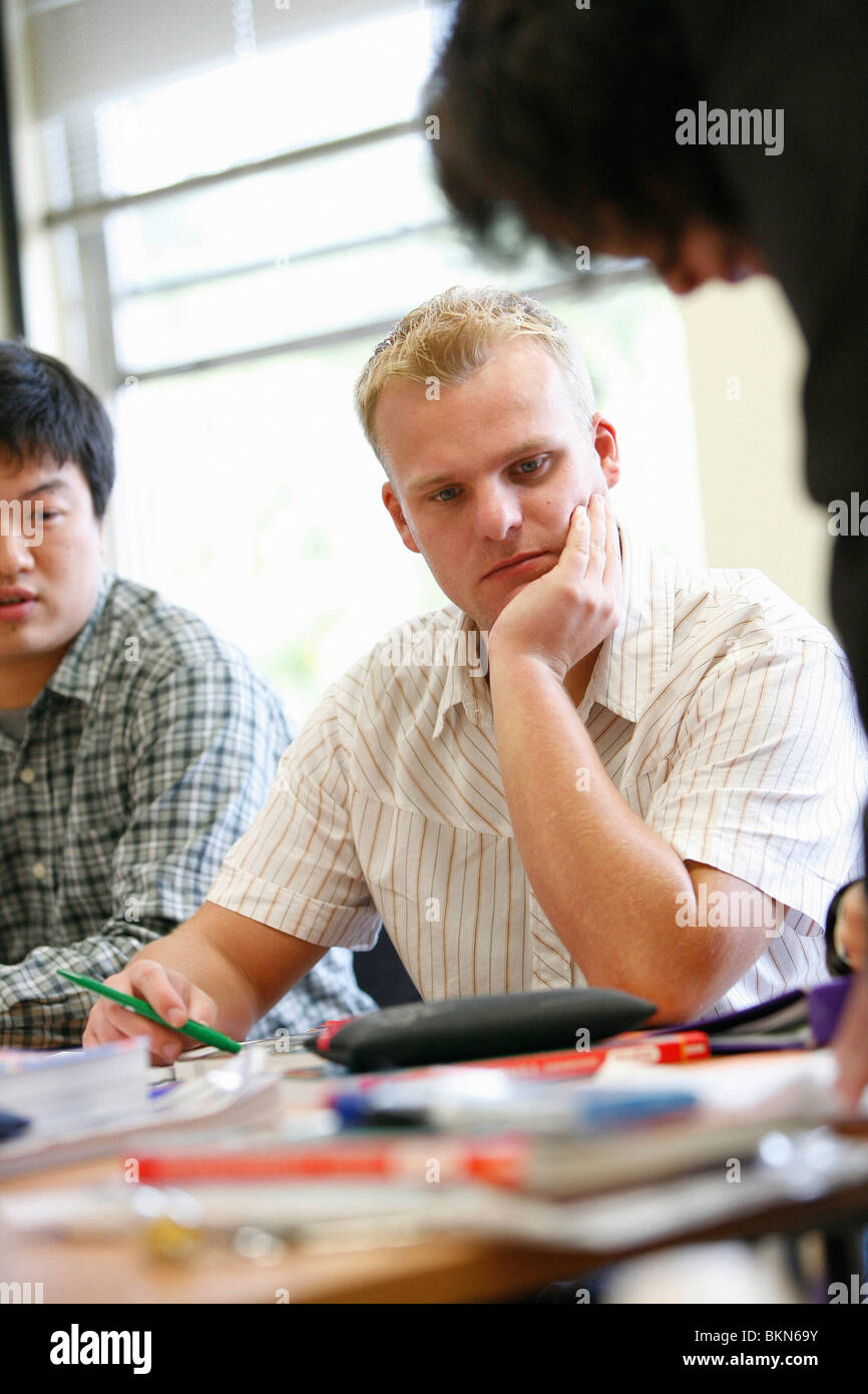 Male student studying in a lecture at university Stock Photo - Alamy