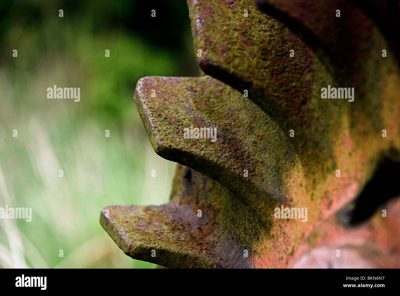 Close-up of old engine in a field Stock Photo - Alamy